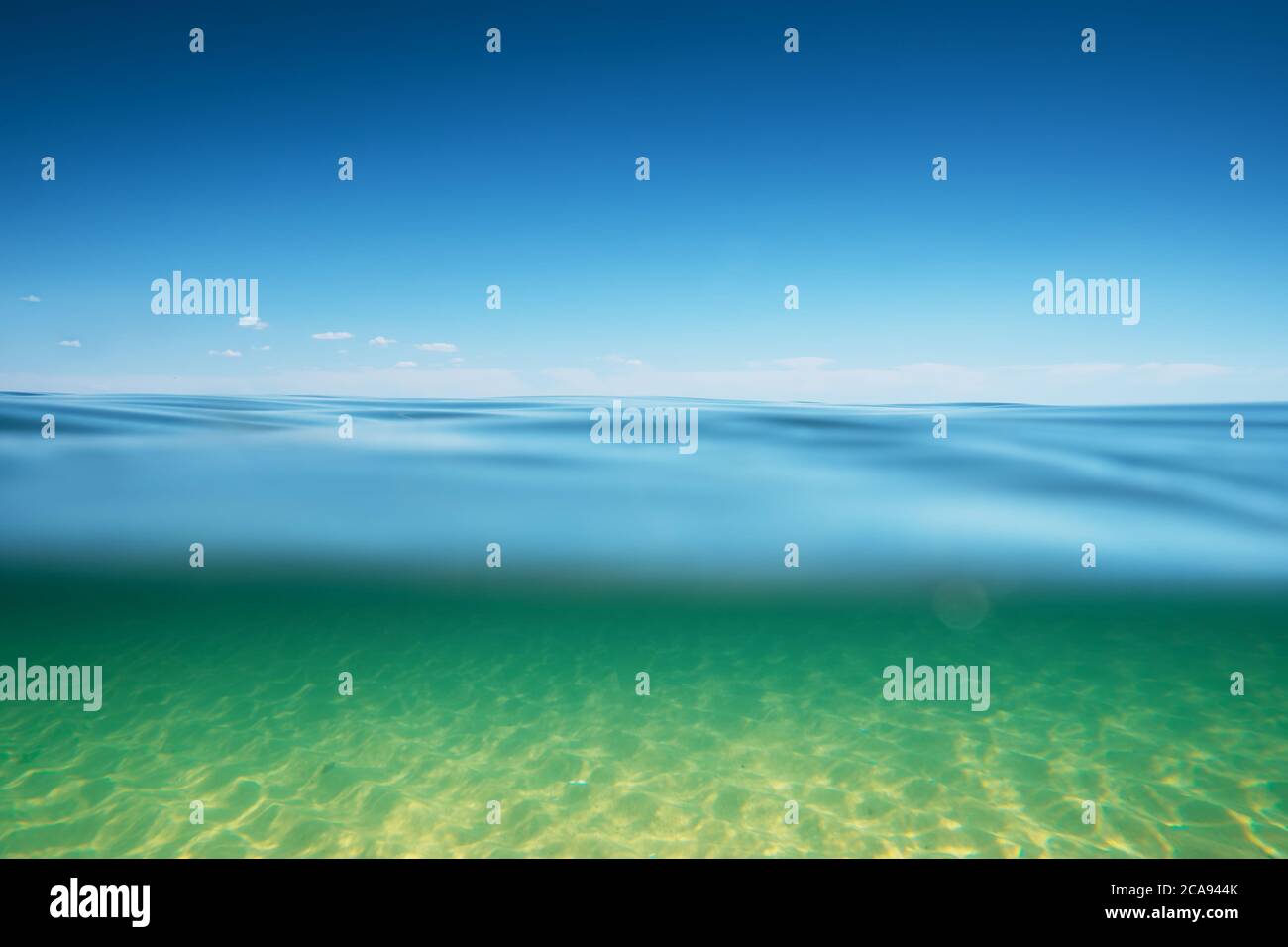 Sea water surface with underwater deep space Stock Photo - Alamy