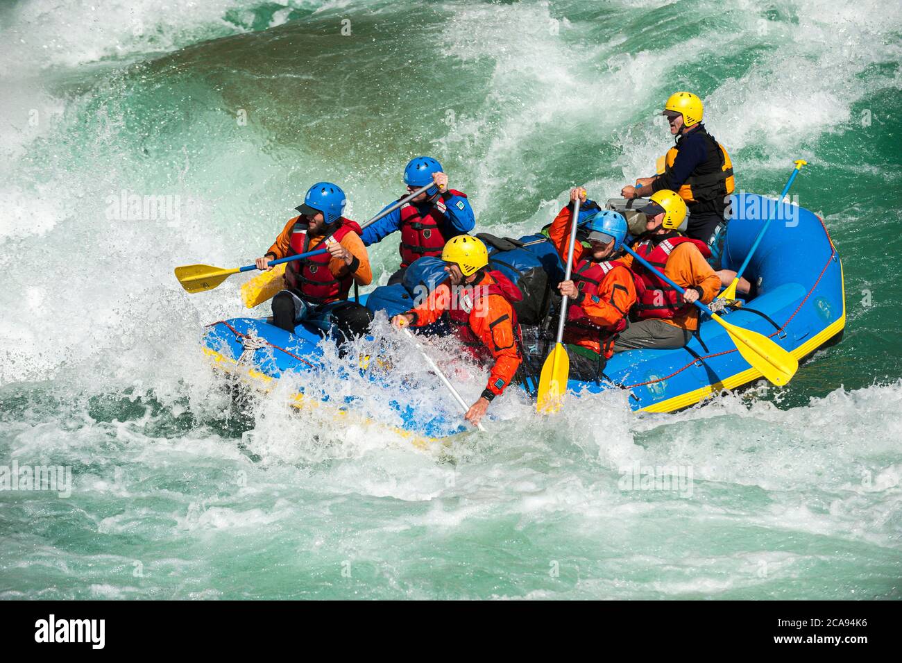 Rafting through white water rapids on the Karnali River in west Nepal ...