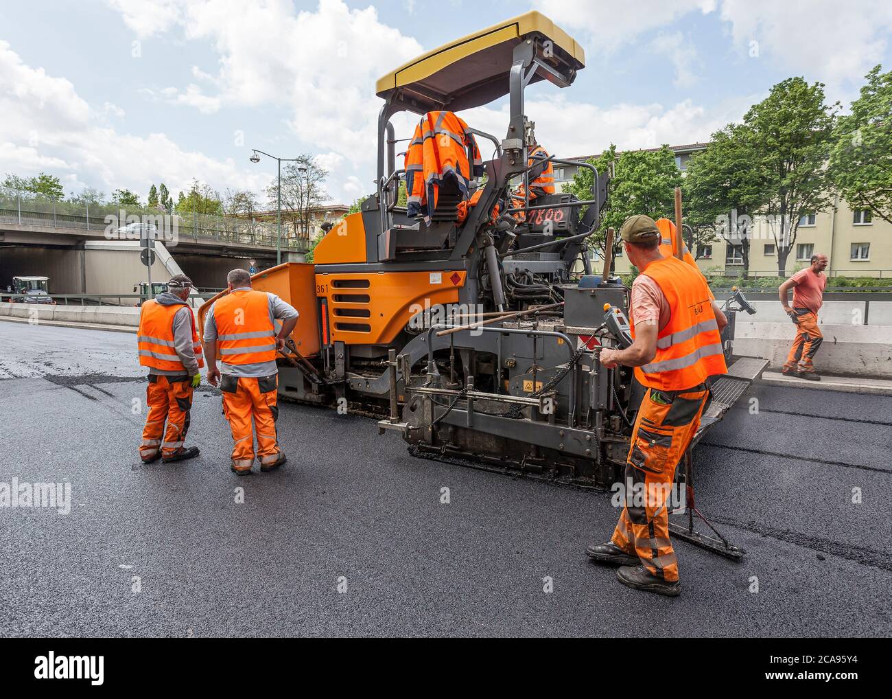 Roadworks, application of new asphalt on german highway Stock Photo - Alamy