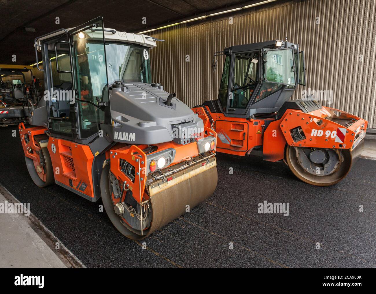 Roadworks, application of new asphalt on german highway Stock Photo - Alamy