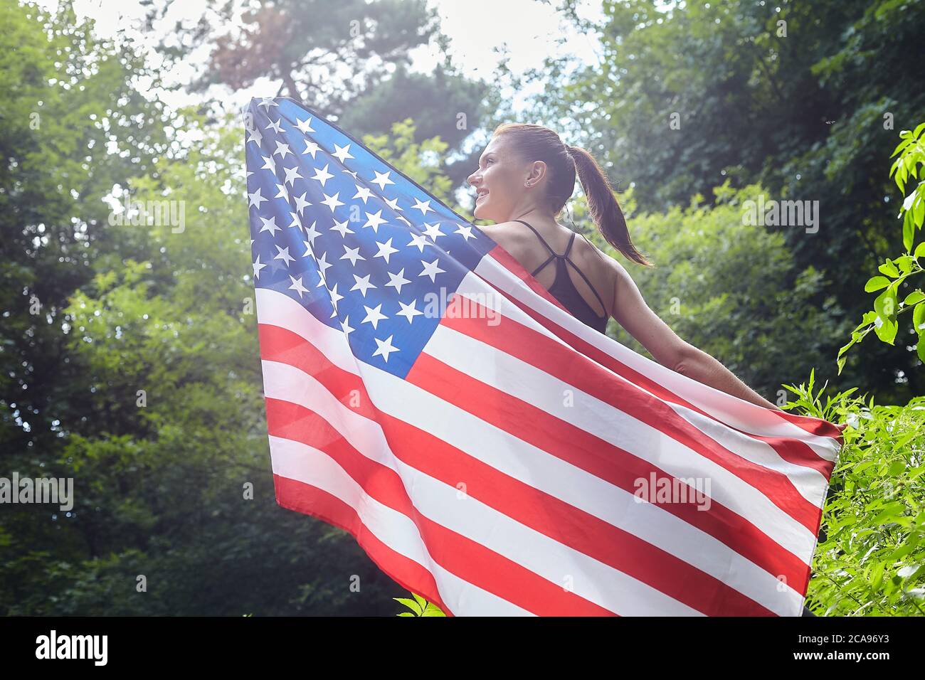 Posing with american flag hi-res stock photography and images - Alamy