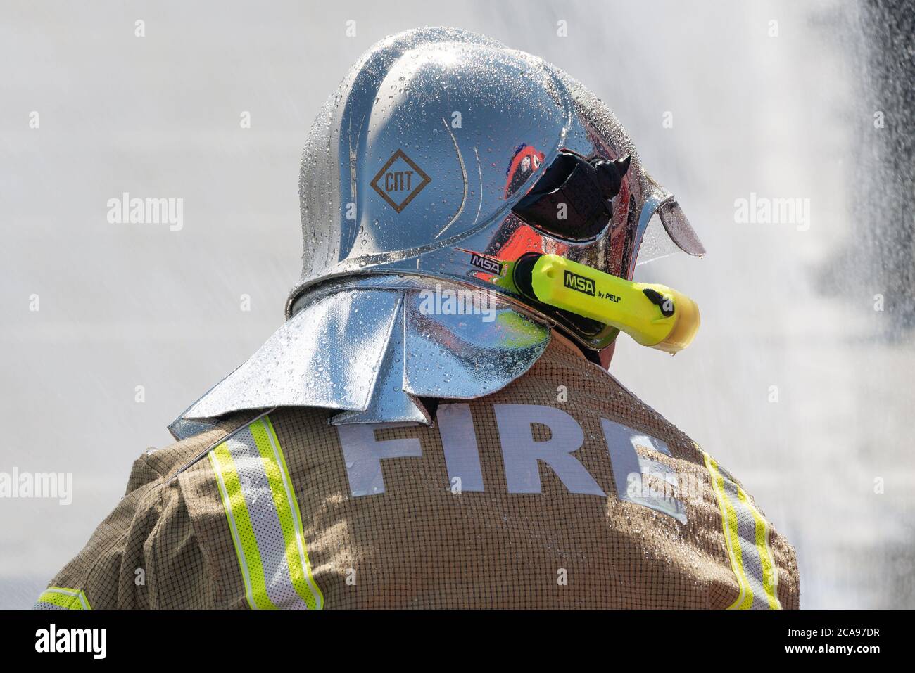 Back view of inscription Fire on uniform firefighter Emercom of Russia ...