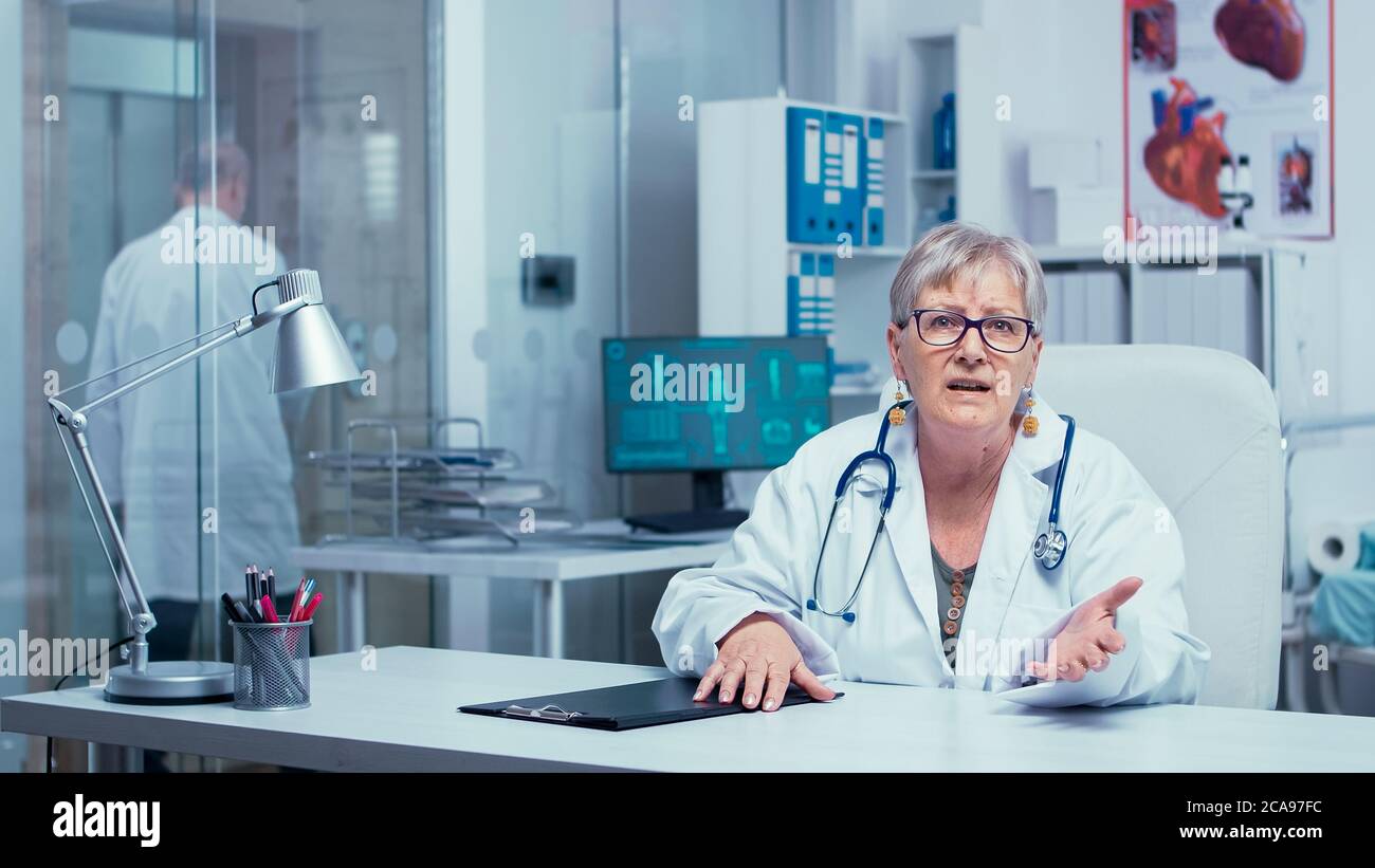 Authentic experienced old woman doctor hi-res stock photography and ...