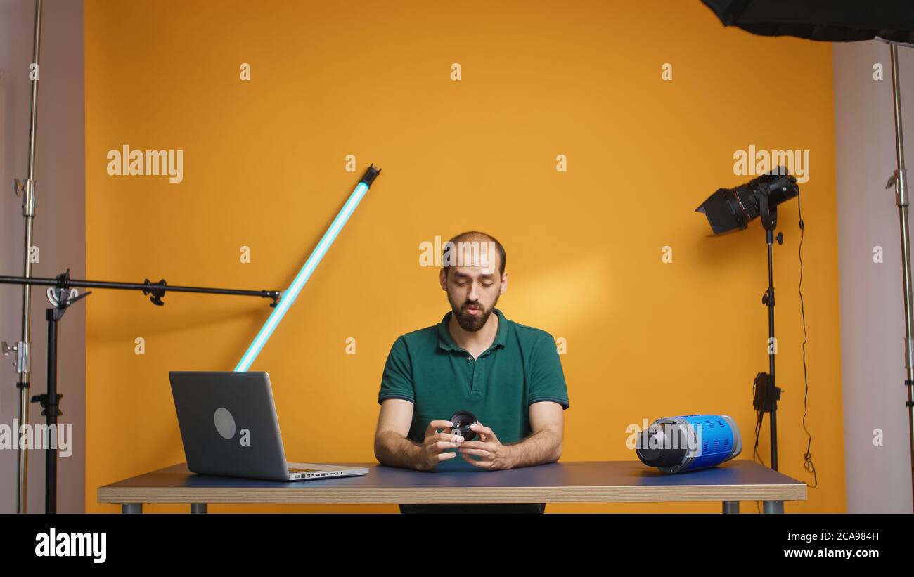Photographer recording tech lens review hi-res stock photography and ...