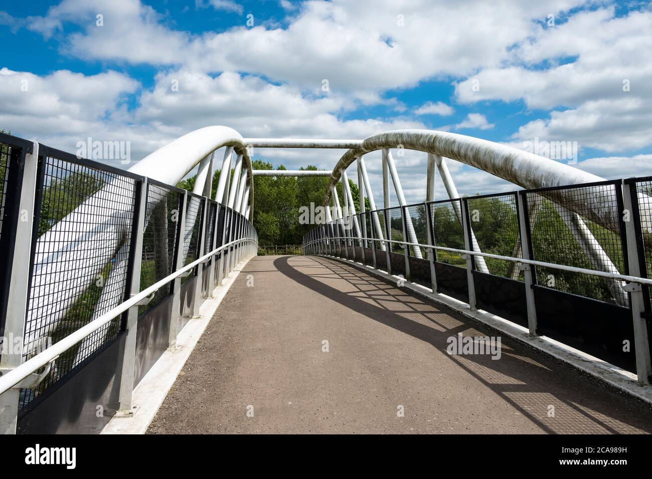 Pedestrian river bridge example Stock Photo - Alamy