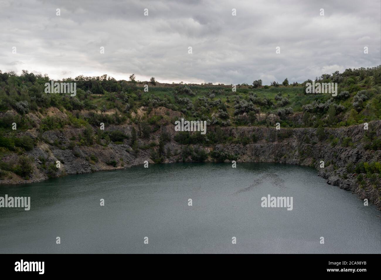 industrial quarry texture of rocks, stone texture, filled with water ...