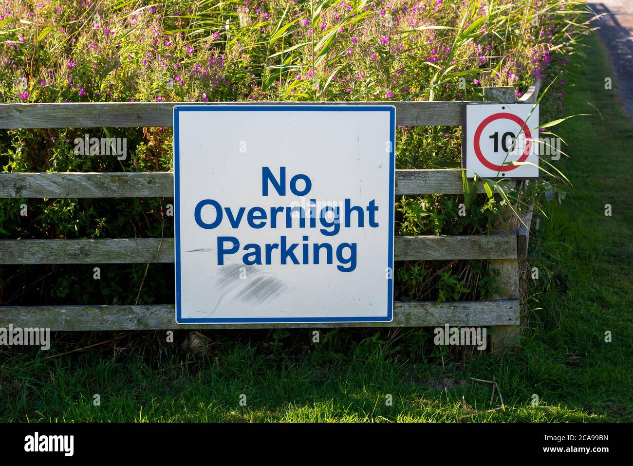 No overnight parking sign in a UK car park Stock Photo - Alamy