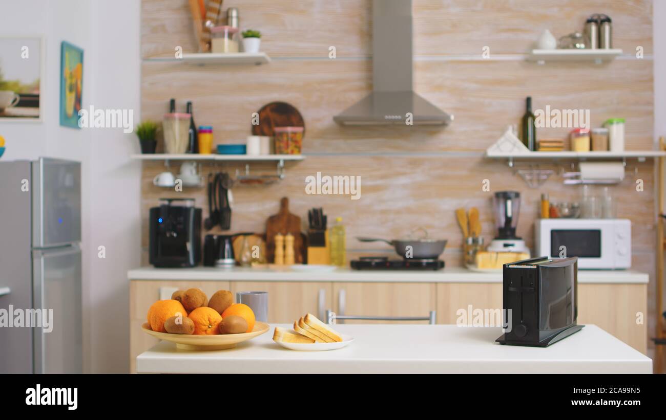 Bread toaster in kitchen with nobody in it. Modern kitchen coffee ...