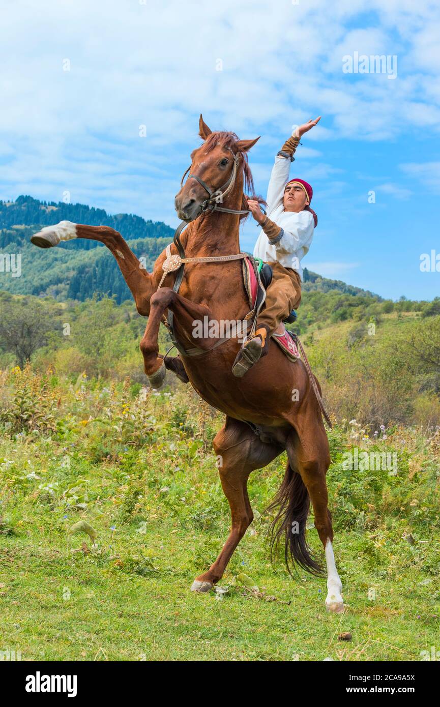Man on a rearing horse, Kazakh ethnographical village Aul Gunny, Talgar ...