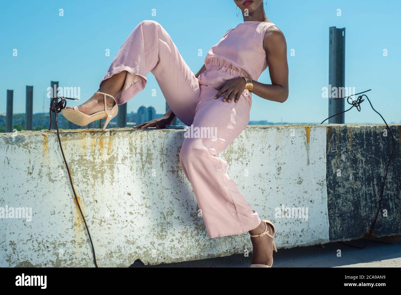 Pink overalls hi-res stock photography and images - Alamy