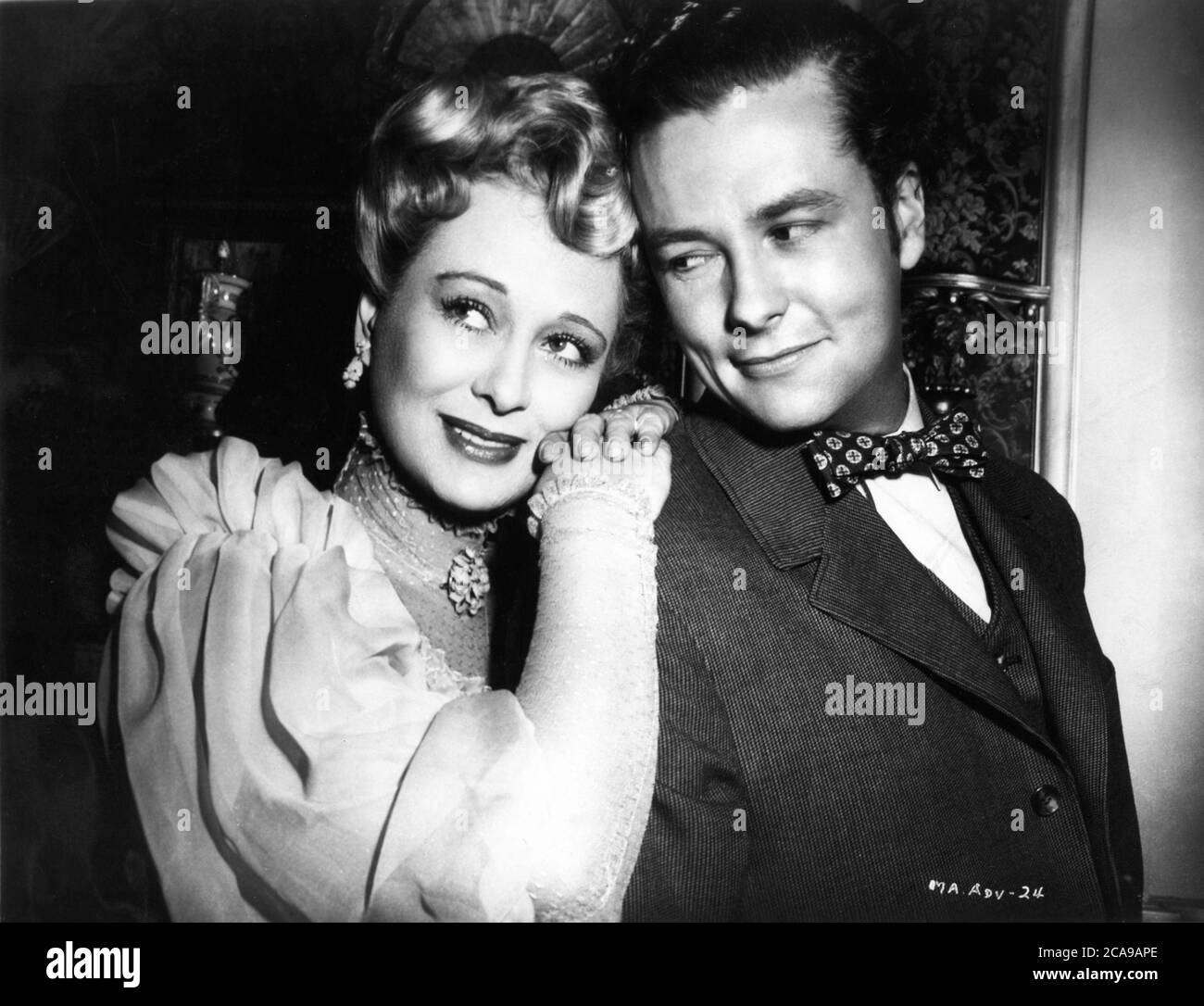 DOLORES COSTELLO and TIM HOLT on set candid portrait during filming of ...