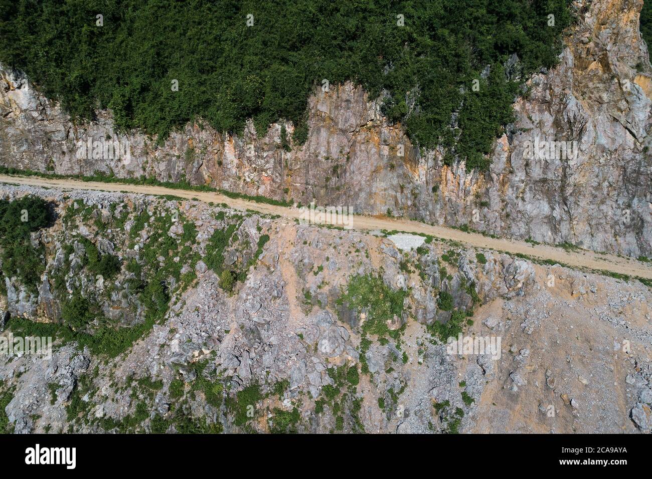 aerial view of tough high mountain road Stock Photo - Alamy