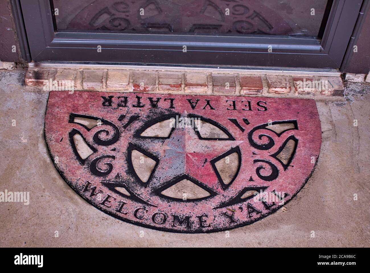 Colorful Texas themed welcome mat Stock Photo - Alamy