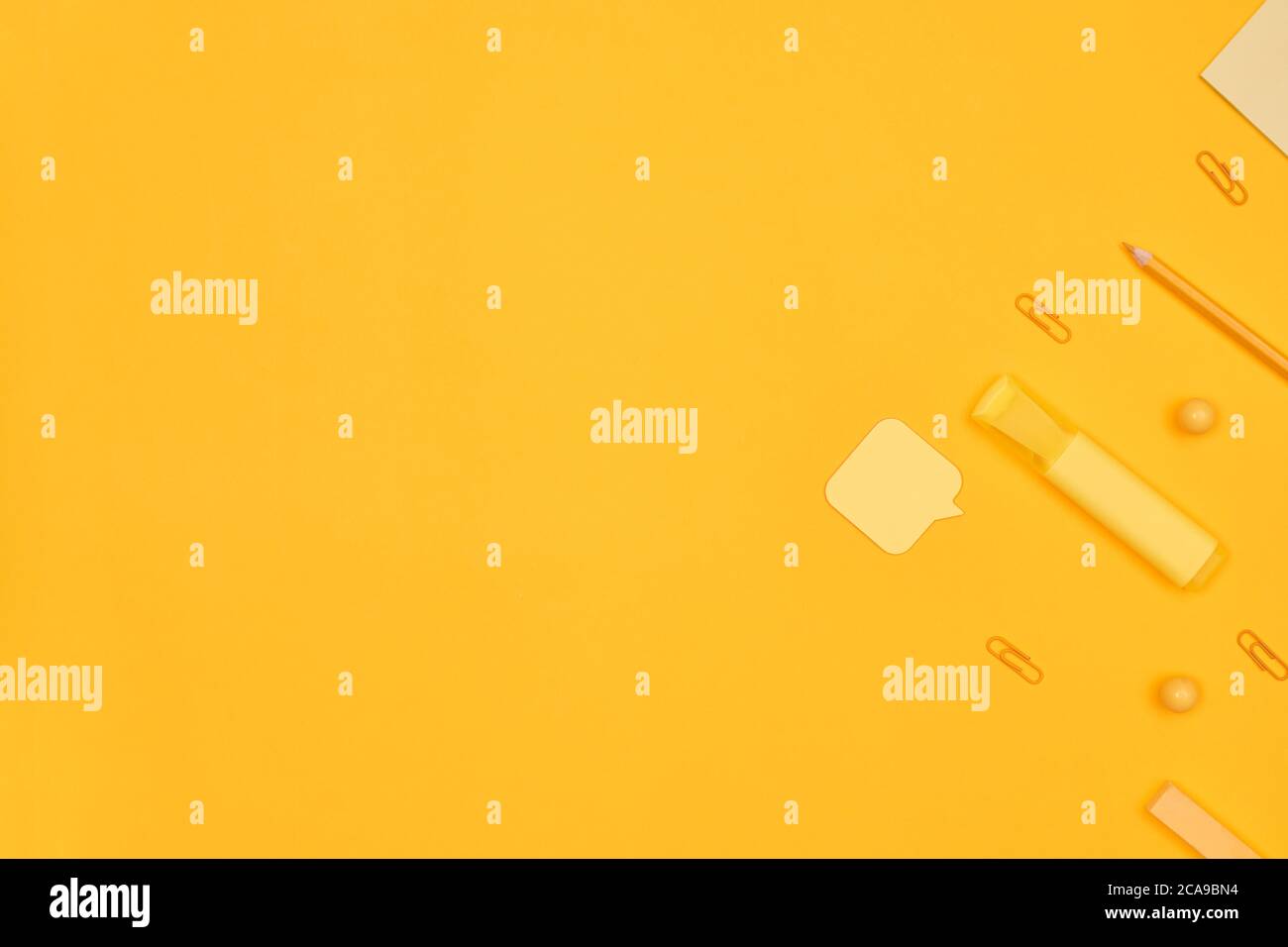 minimalism yellow stationery on a yellow background school, university ...
