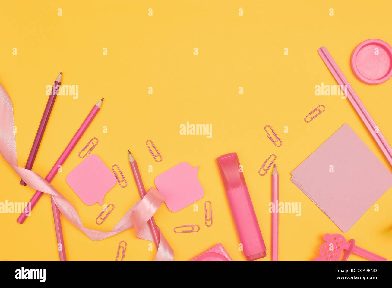 Minimalism, Back to school concept, Pink school supplies on yellow ...