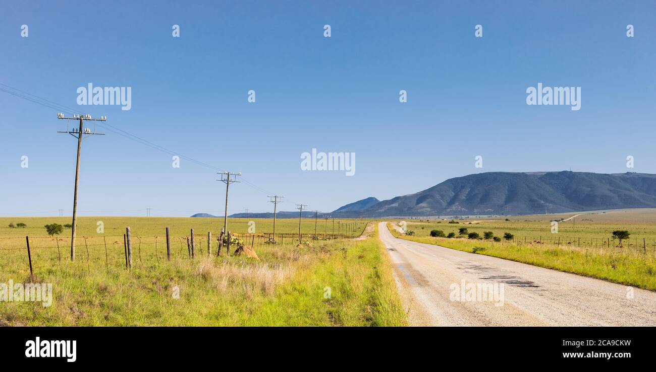 View of an empty country highway road in South African Farmland region ...