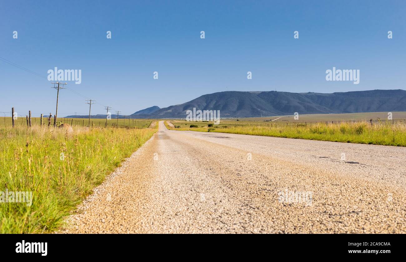 View of an empty country highway road in South African Farmland region ...