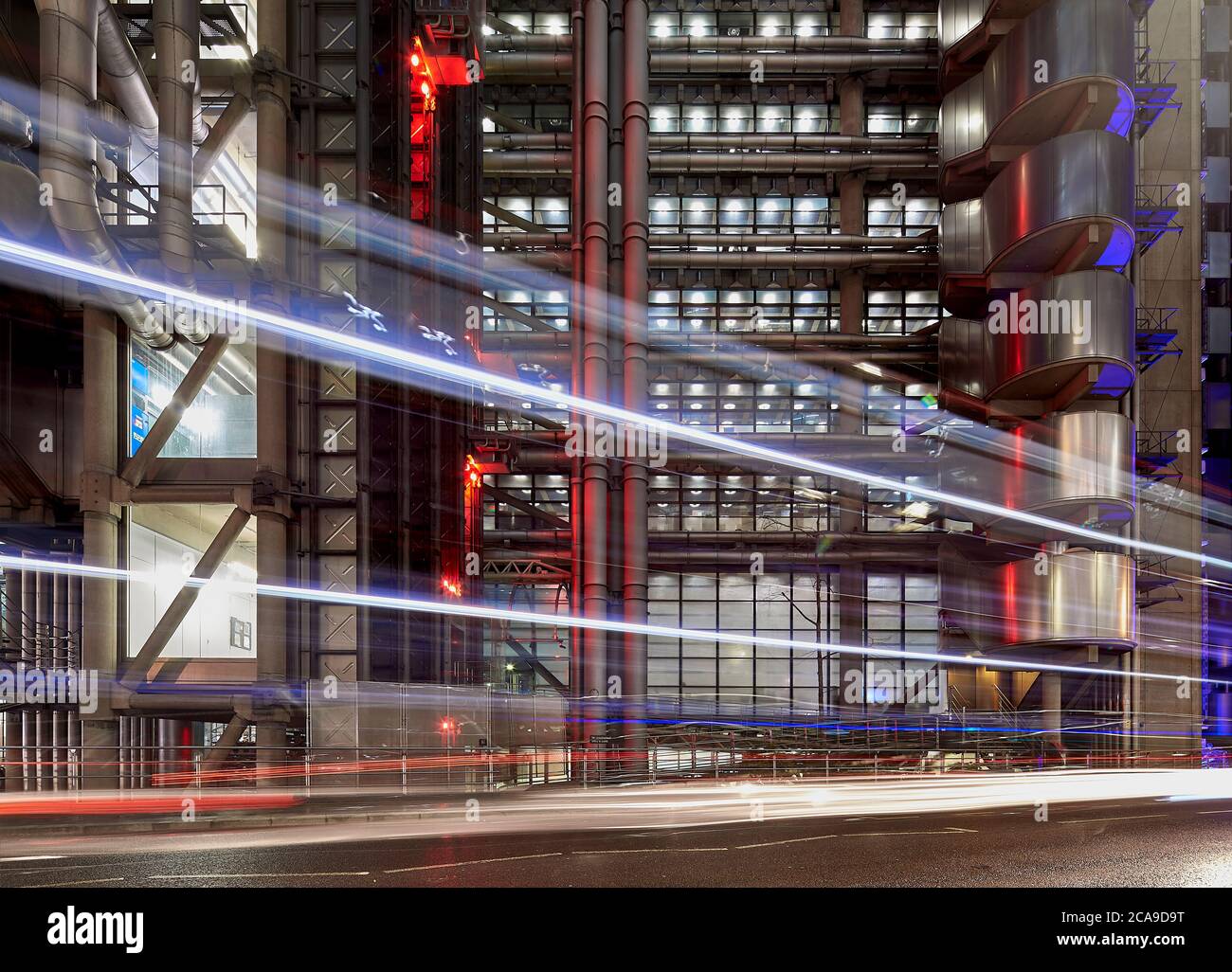 Lloyd's Building at night with passing traffic light trails Stock Photo ...
