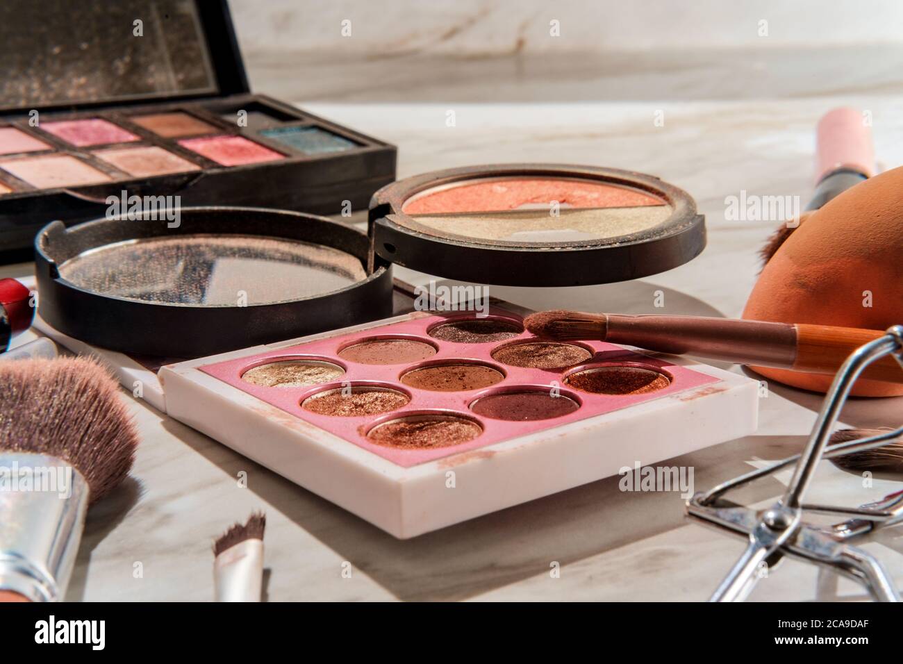 Beauty and cosmetics theme used makeup kit on marble bathroom table ...