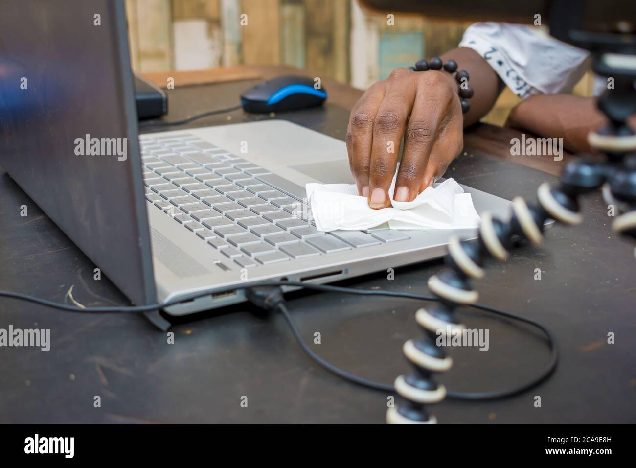Woman hands wiping laptop keyboard hi-res stock photography and images ...