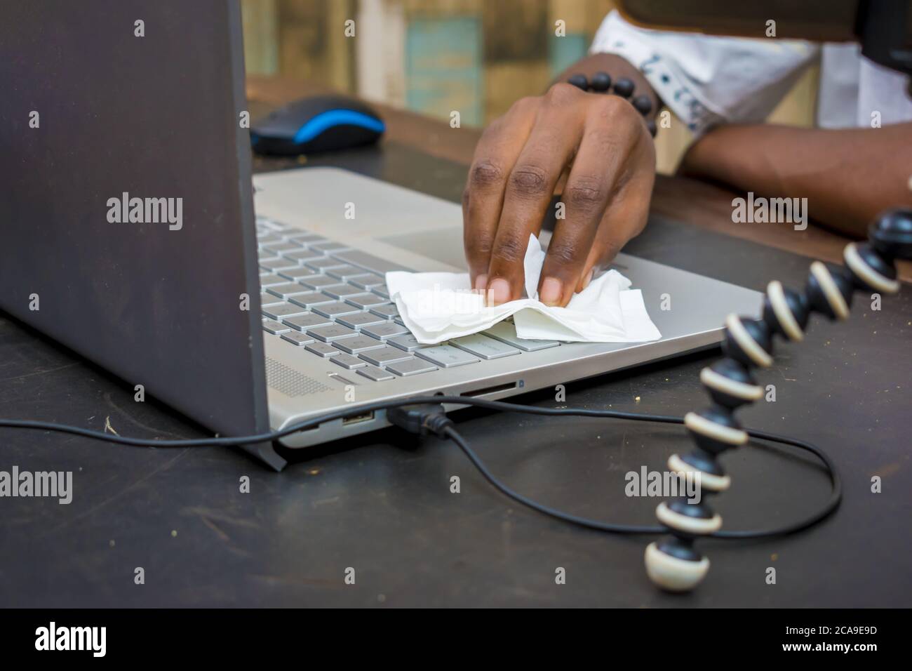Woman hands wiping laptop keyboard hi-res stock photography and images ...