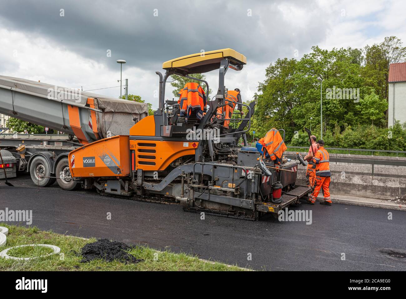 Roadworks, application of new asphalt on german highway Stock Photo - Alamy