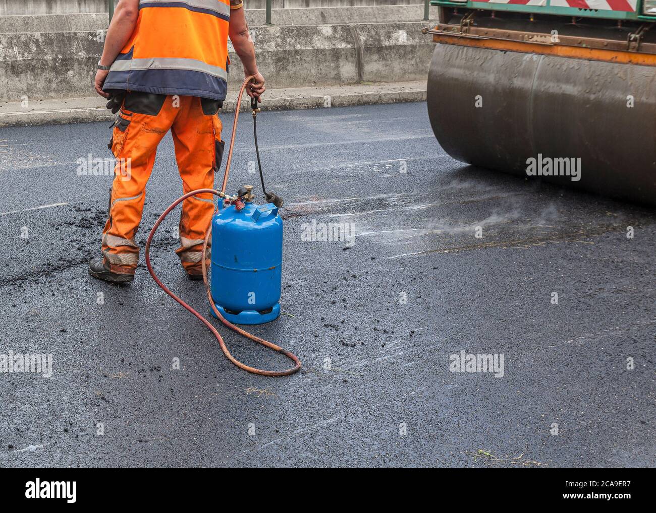 Road coating heat hi-res stock photography and images - Alamy