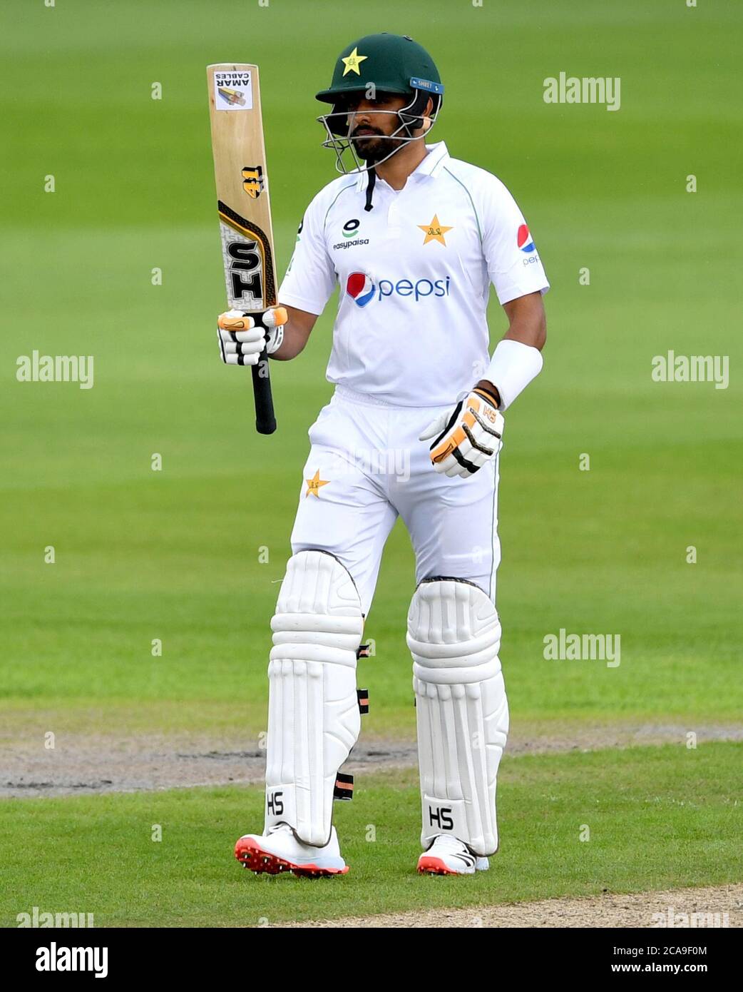 Pakistan's Babar Azam after reaching his half century during day one of ...