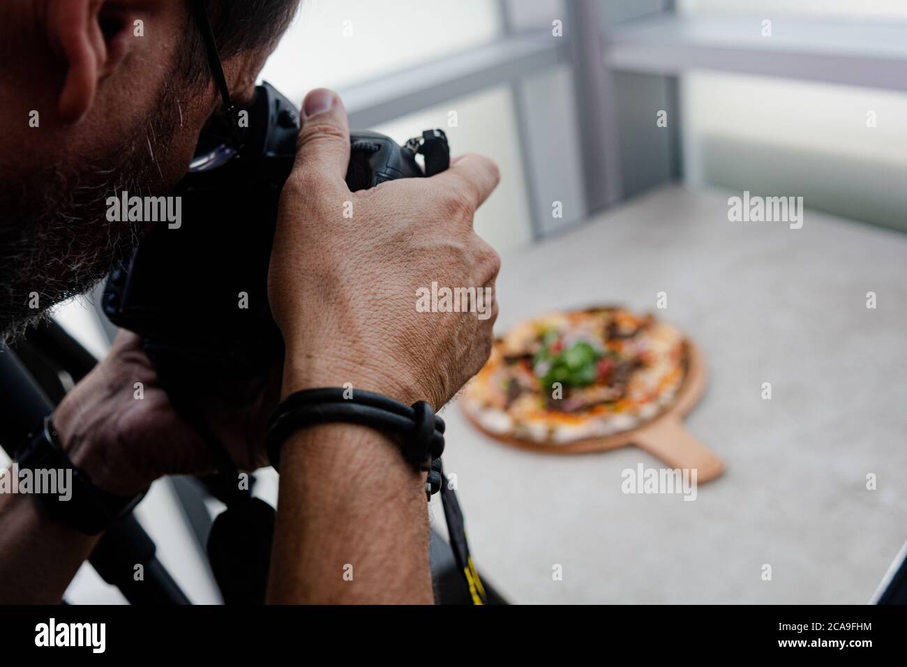 Food photographer is shooting pizza Stock Photo - Alamy