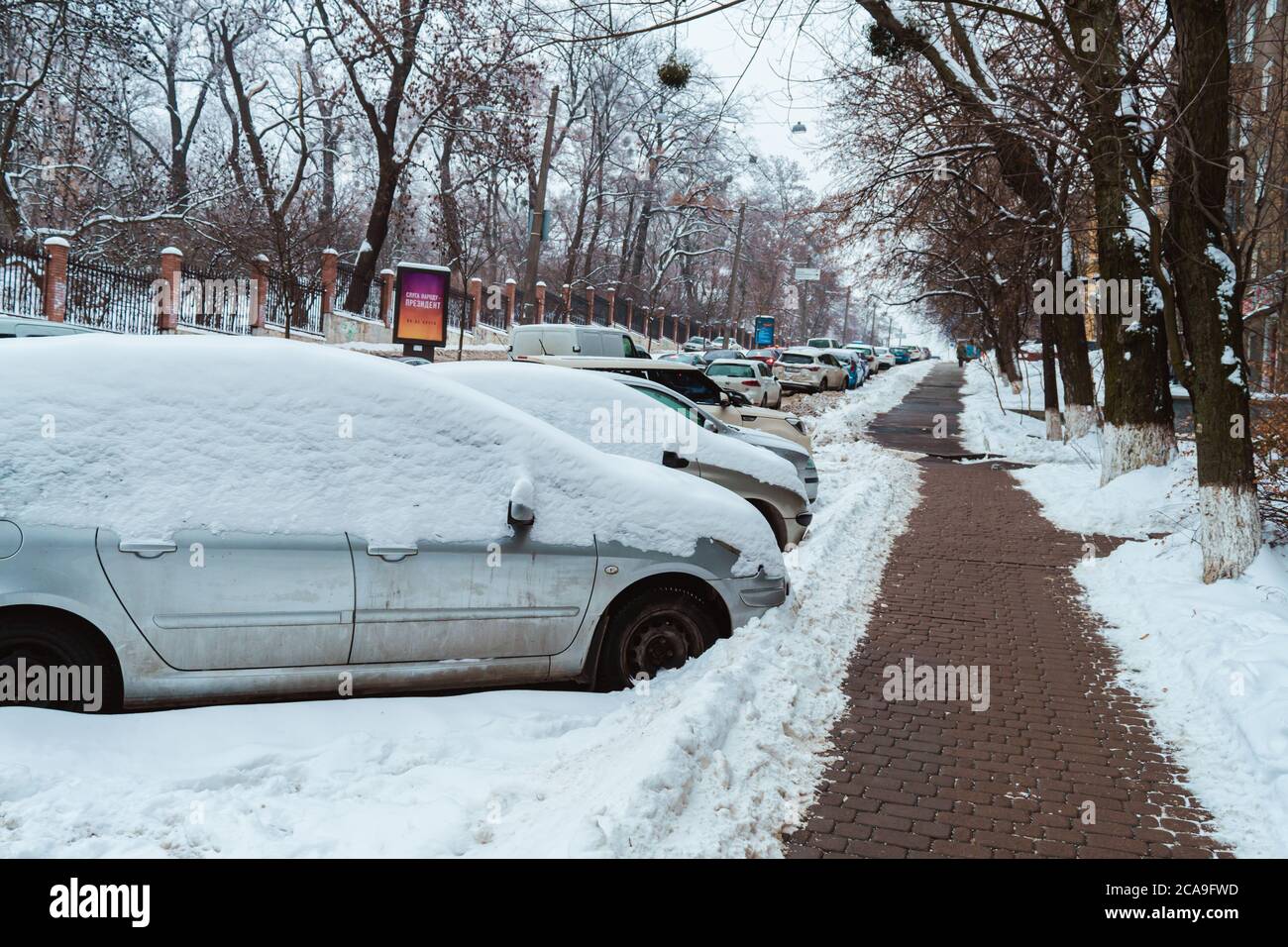 KYIV, UKRAINE - JANUARY 28,2019: Streets and cars after snow storm in ...