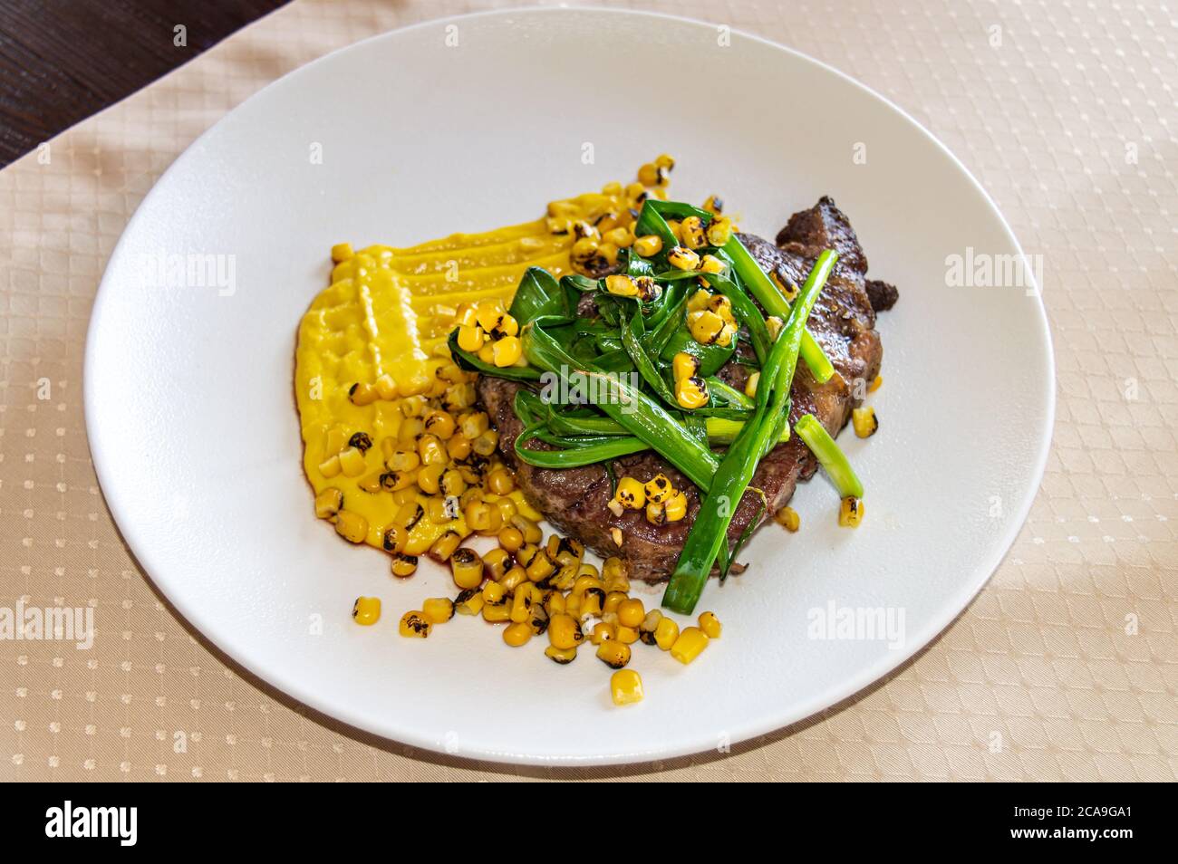 Beef grilled meat with vegetables Stock Photo - Alamy