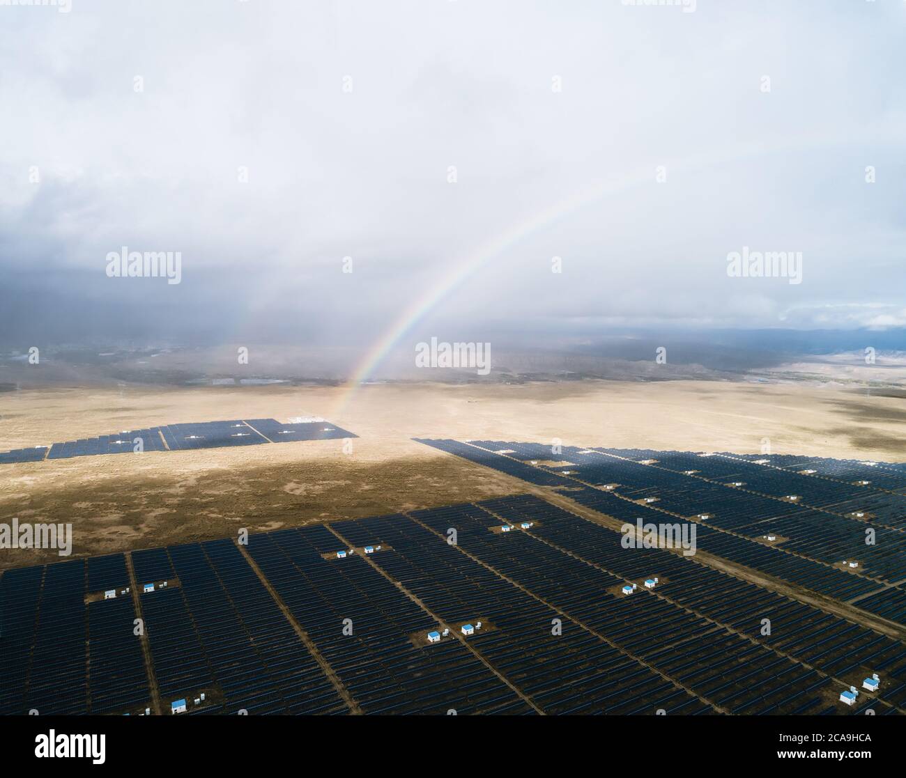 rainbow and photovoltaic panels of solar power station Stock Photo - Alamy