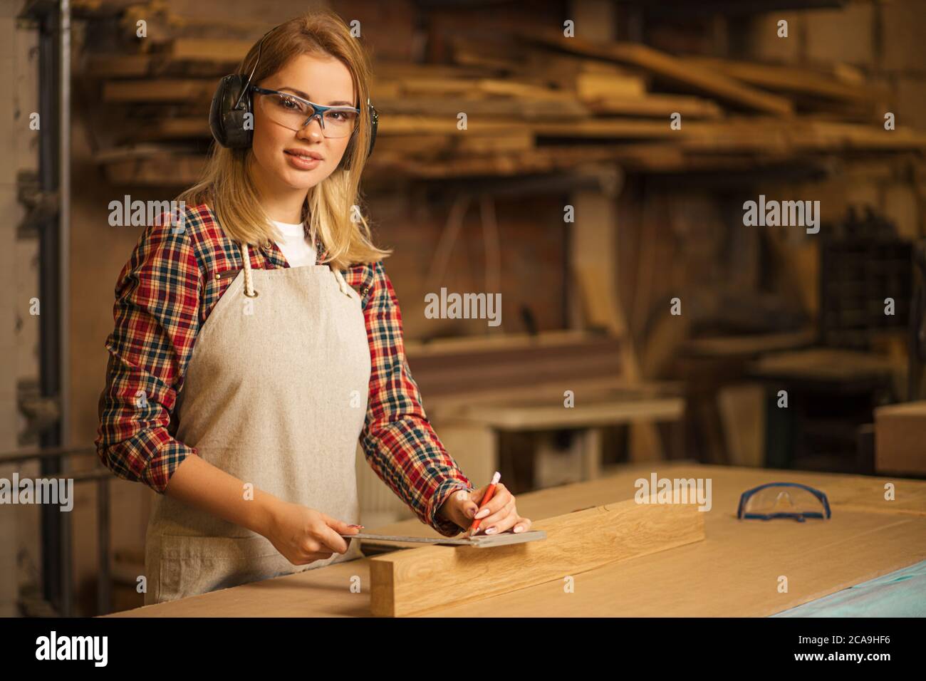 portrait of young caucasian professional handicraft maker, woman make ...