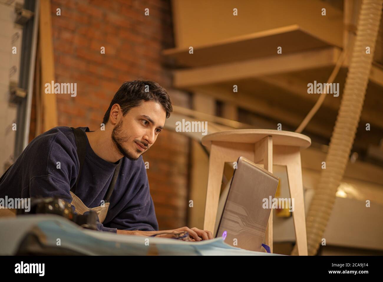 Furniture maker skillfully wooden chair hi-res stock photography and ...