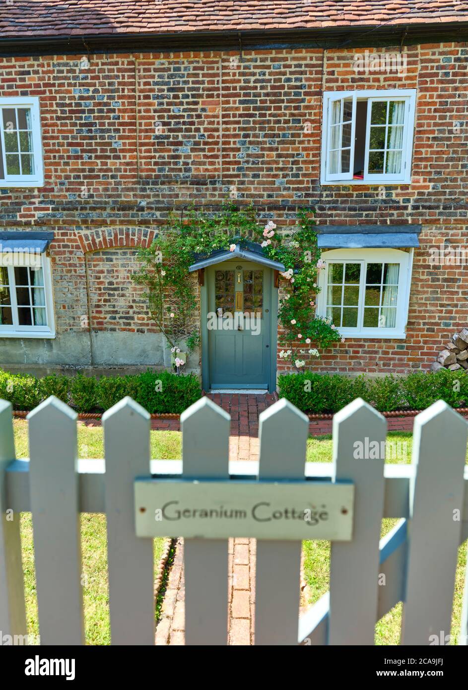 Geranium Cottage - a typical red brick cottage house building with a ...