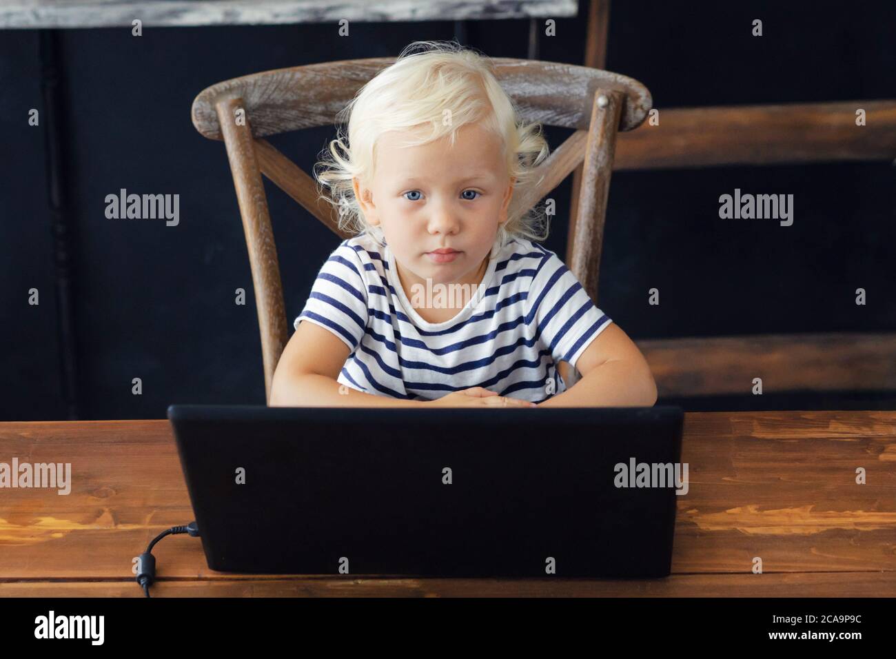 Toddler at computer hi-res stock photography and images - Alamy