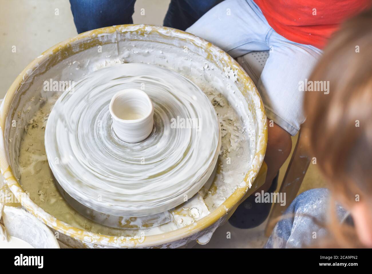 Children making pottery during ceramic lesson with clay Stock Photo - Alamy