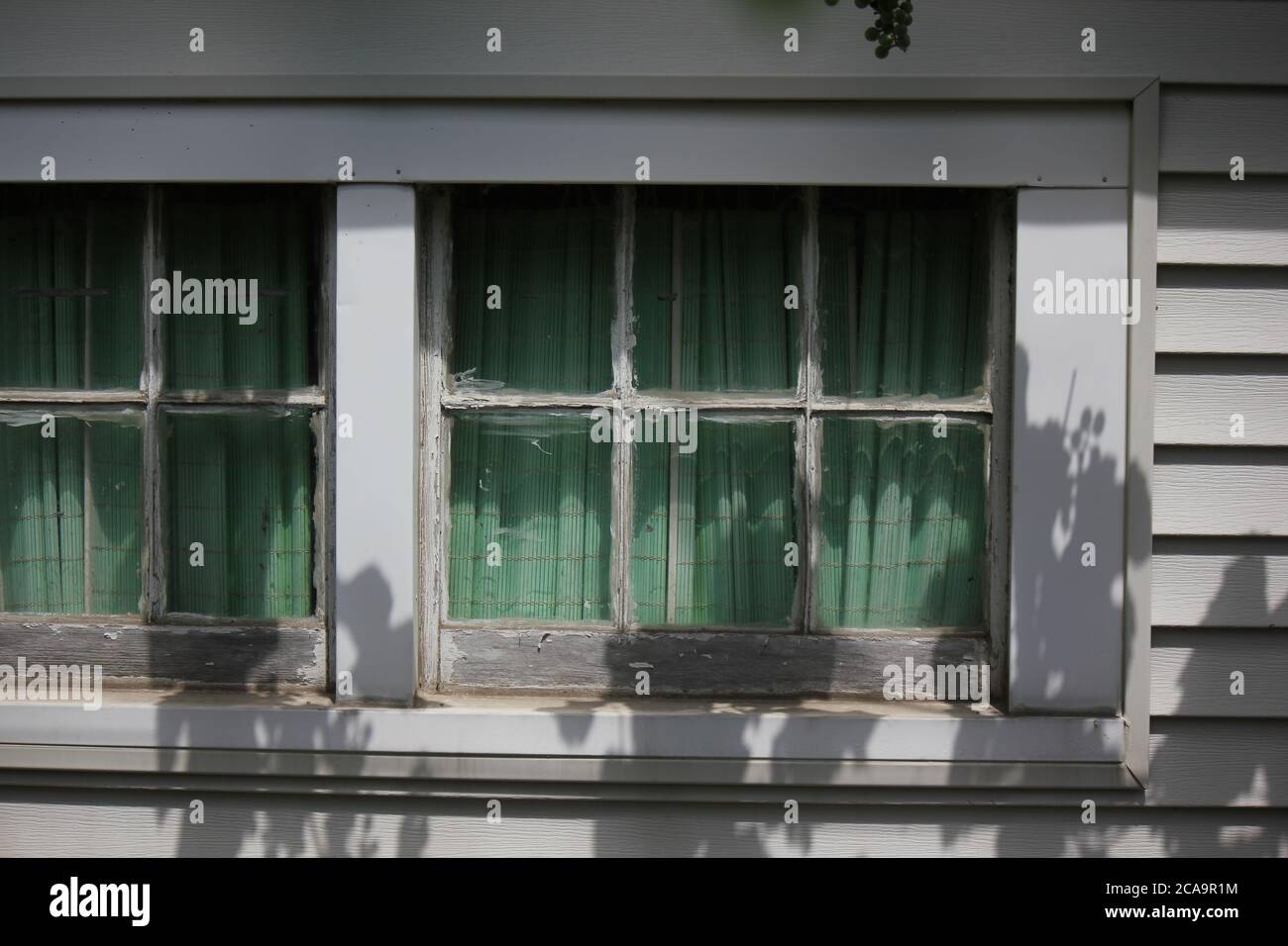 Old weathered garage window Stock Photo - Alamy