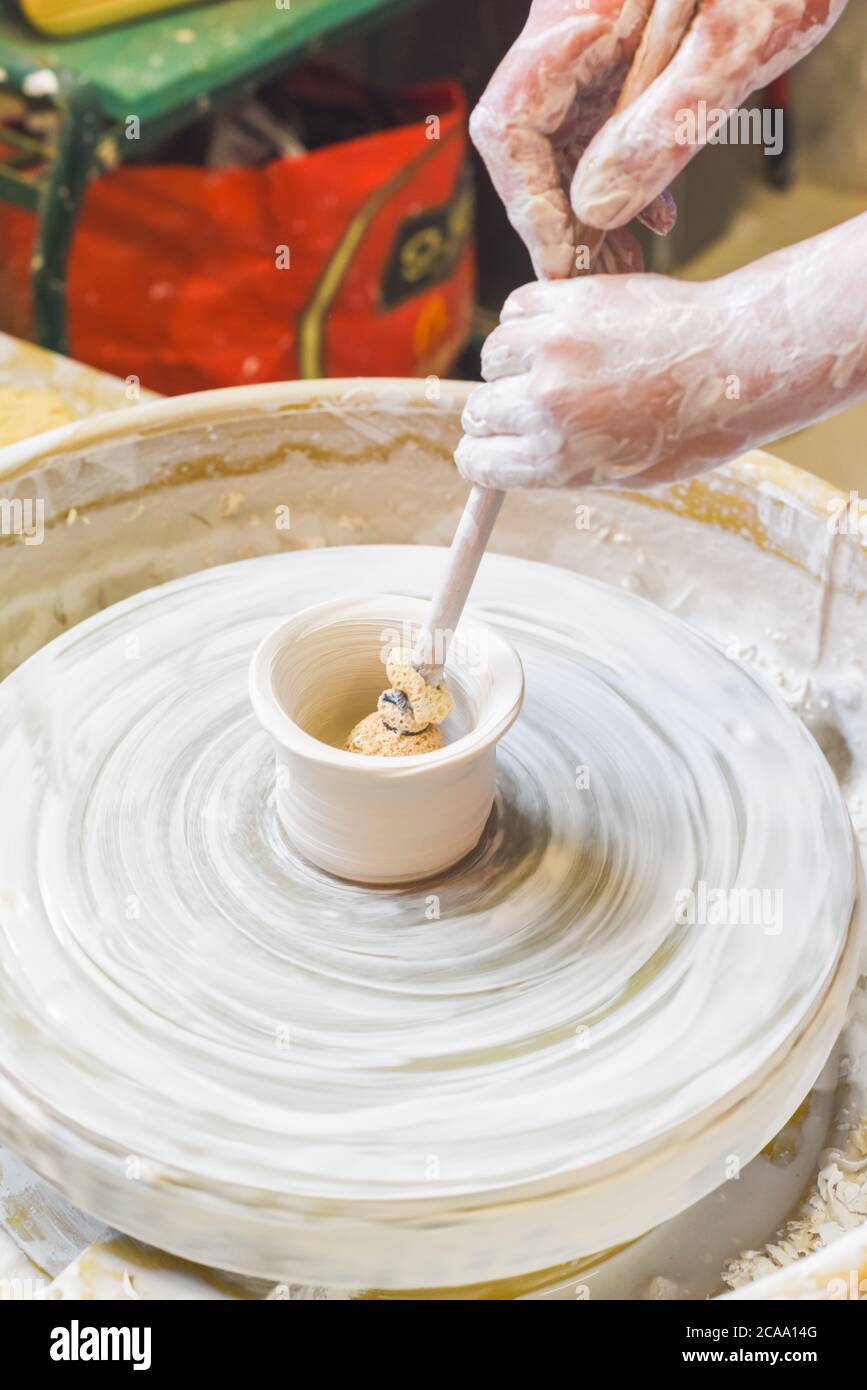 Children making pottery during ceramic lesson with clay Stock Photo - Alamy