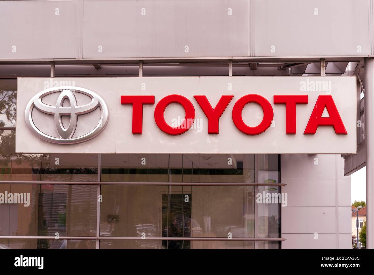 Toyota company logo seen on one of their car dealerships showrooms in ...