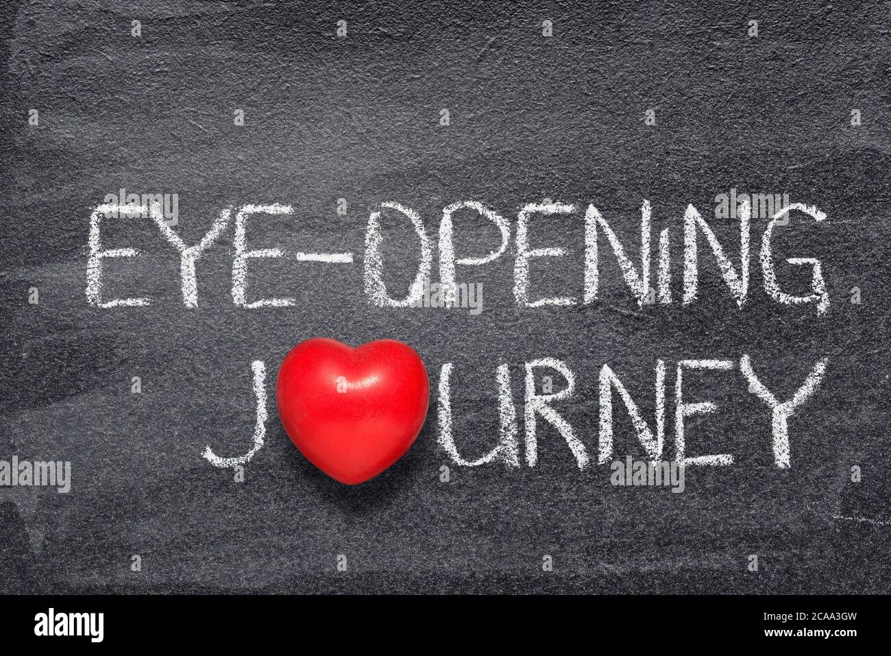 eye-opening journey phrase written on chalkboard with red heart symbol ...