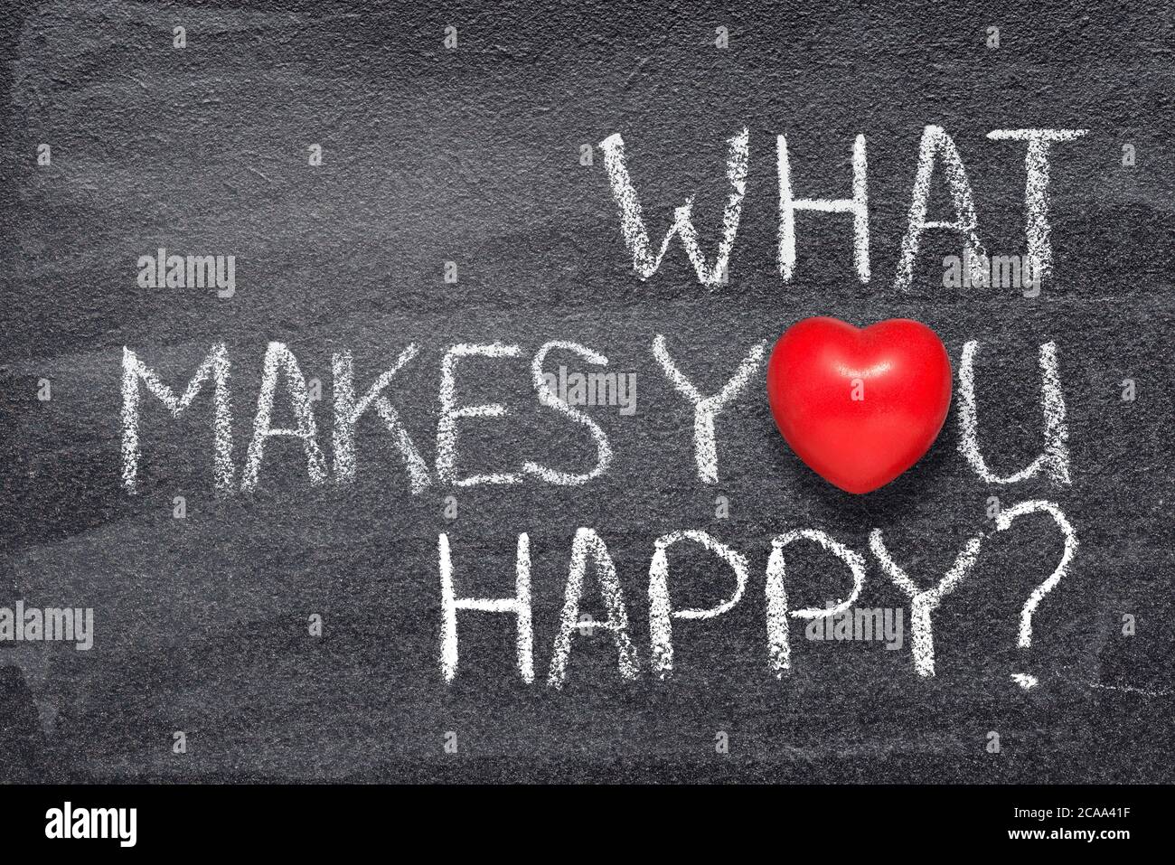 what makes you happy question written on chalkboard with red heart ...