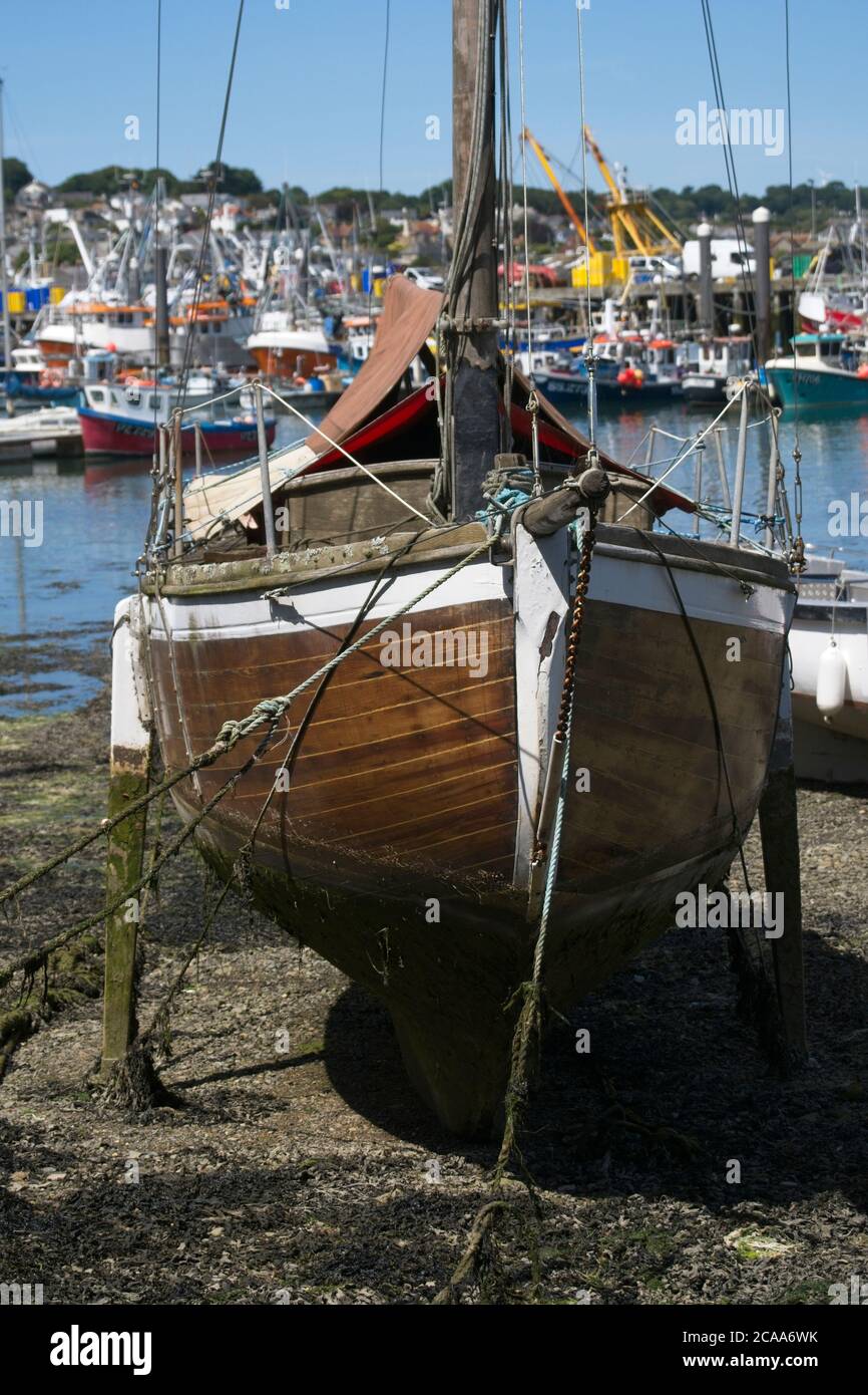 Traditional timber hulled sailing vessel Bow view Vessel on hard ...