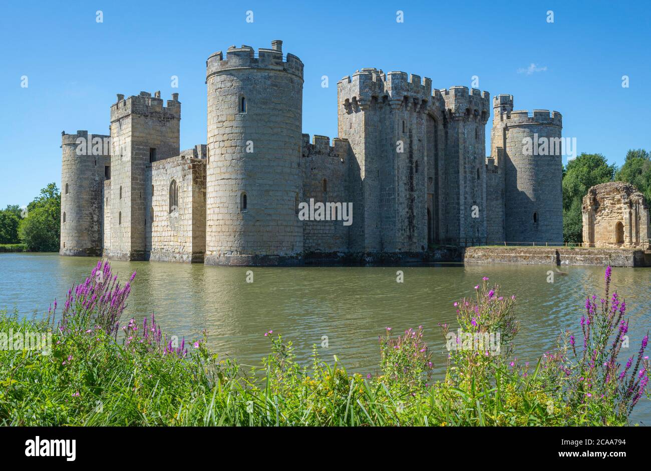 Side and front view of Bodiam Castle with blue sky, no clouds and no ...