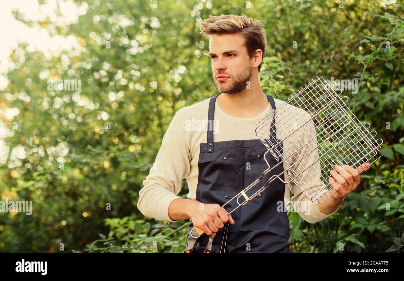 Backyard barbeque party. Tools for roasting meat outdoors. Picnic ...