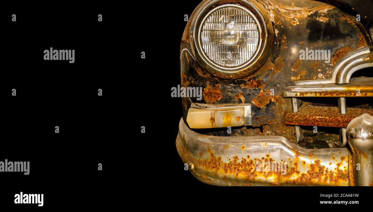 vintage rusty car isolated on black Stock Photo - Alamy