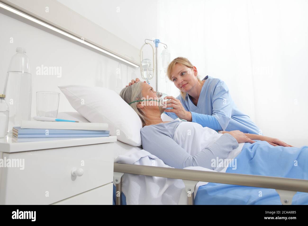 Female Oxygen Mask Woman In Hospital Bed at Caitlin Kelley blog