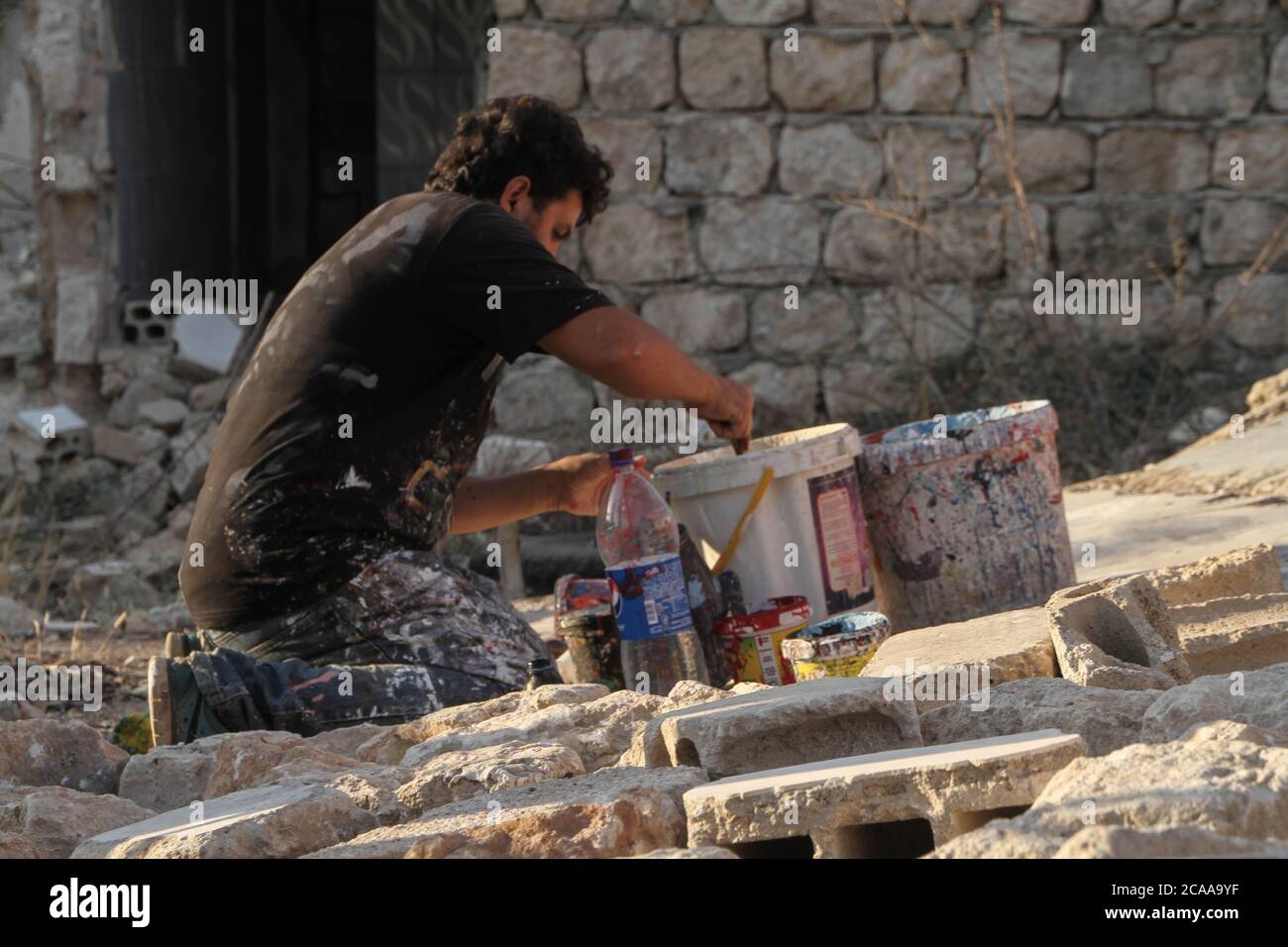 Idlib, Syria. August 5, 2020: A mural picture of Aziz Al-Asmar in ...