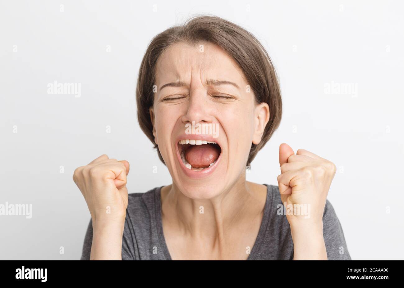 The woman is screaming and crying emotionally Stock Photo - Alamy