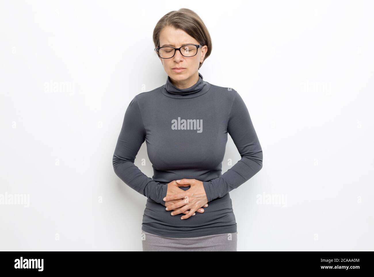 Abdominal pain. Period. Menstruation. Diarrhea Stock Photo - Alamy